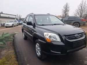 Black Kia Sportage 2011 in Utena, with an engine capacity of 2.00 L and mileage of 211 thousand km for 3800 €, photo  on AUTOMOTO.COM.LV
