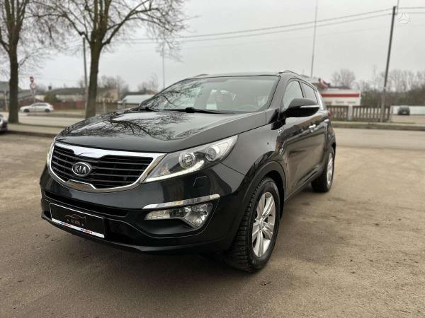 Black Kia Sportage 2011 in Siauliai, with an engine capacity of 2.00 L and mileage of 286 thousand km for 6750 €, photo 4 on AUTOMOTO.COM.LV