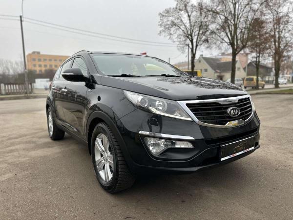 Black Kia Sportage 2011 in Siauliai, with an engine capacity of 2.00 L and mileage of 286 thousand km for 6750 €, photo 6 on AUTOMOTO.COM.LV