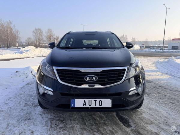 Black Kia Sportage 2011 in Taurage, with an engine capacity of 2.00 L and mileage of 216 thousand km for 6199 €, photo 2 on AUTOMOTO.COM.LV