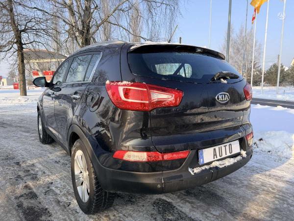 Black Kia Sportage 2011 in Taurage, with an engine capacity of 2.00 L and mileage of 216 thousand km for 6199 €, photo 10 on AUTOMOTO.COM.LV