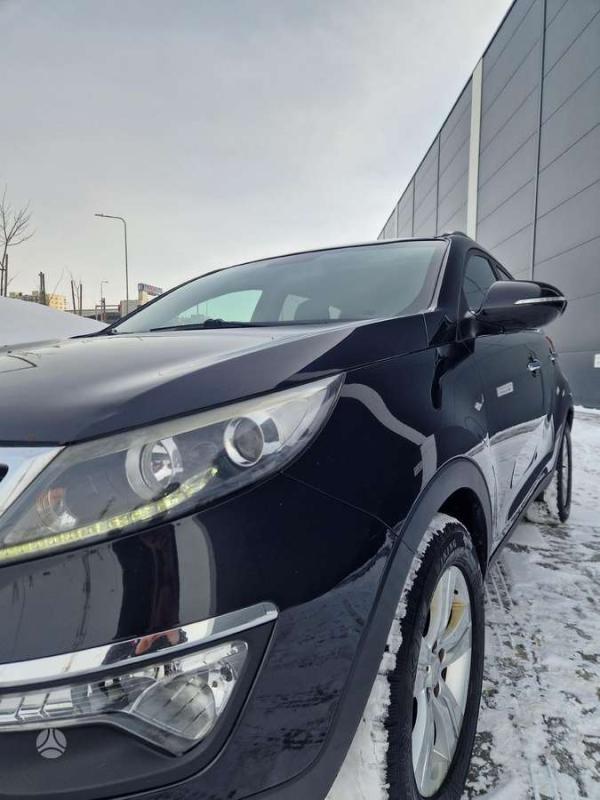 Black Kia Sportage 2011 in Vilnius, with an engine capacity of 1.69 L and mileage of 246 thousand km for 5500 €, photo 10 on AUTOMOTO.COM.LV
