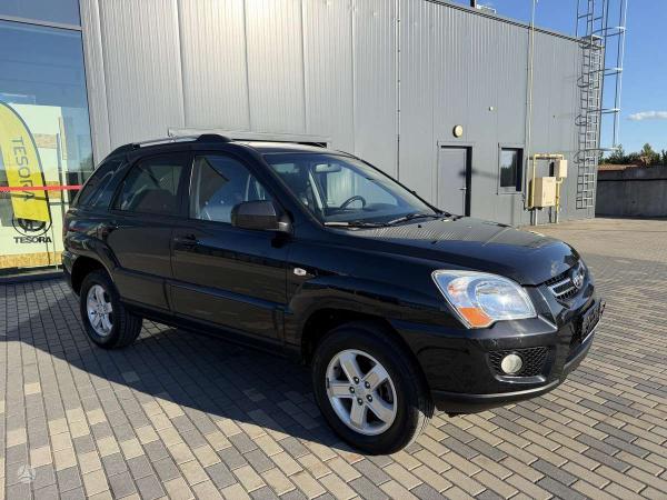 Black Kia Sportage 2011 in Siauliai, with an engine capacity of 1.99 L and mileage of 181 thousand km for 4100 €, photo 3 on AUTOMOTO.COM.LV