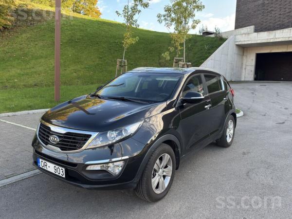 Black Kia Sportage 2011 in Rezekne, with an engine capacity of 1.70 L and mileage of 247 thousand km for 6500 €, photo 1 on AUTOMOTO.COM.LV