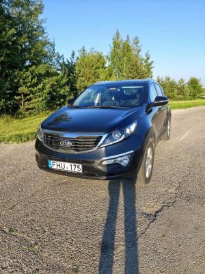 Black Kia Sportage 2011 in Siauliai, with an engine capacity of 2.00 L and mileage of 150 thousand km for 7300 €, photo  on AUTOMOTO.COM.LV