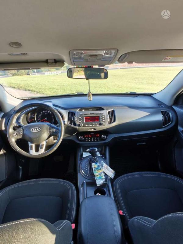 Black Kia Sportage 2011 in Siauliai, with an engine capacity of 2.00 L and mileage of 150 thousand km for 7300 €, photo 8 on AUTOMOTO.COM.LV