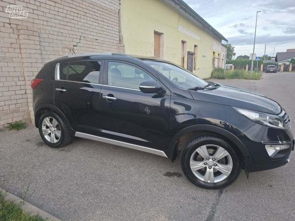 Melns Kia Sportage 2011 Varėna, ar dzinēja tilpumu 2.00 L un nobraukumu 179 tūkst. km par 6100 €, foto 3 vietnē AUTOMOTO.COM.LV