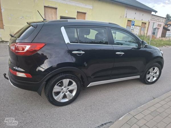 Melns Kia Sportage 2011 Varėna, ar dzinēja tilpumu 2.00 L un nobraukumu 179 tūkst. km par 6100 €, foto 4 vietnē AUTOMOTO.COM.LV