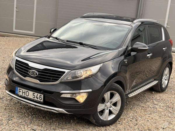 Black Kia Sportage 2011 in Vilnius, with an engine capacity of 2.00 L and mileage of 261 thousand km for 5500 €, photo 1 on AUTOMOTO.COM.LV