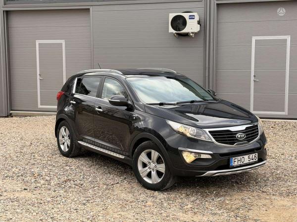 Black Kia Sportage 2011 in Vilnius, with an engine capacity of 2.00 L and mileage of 261 thousand km for 5500 €, photo 4 on AUTOMOTO.COM.LV