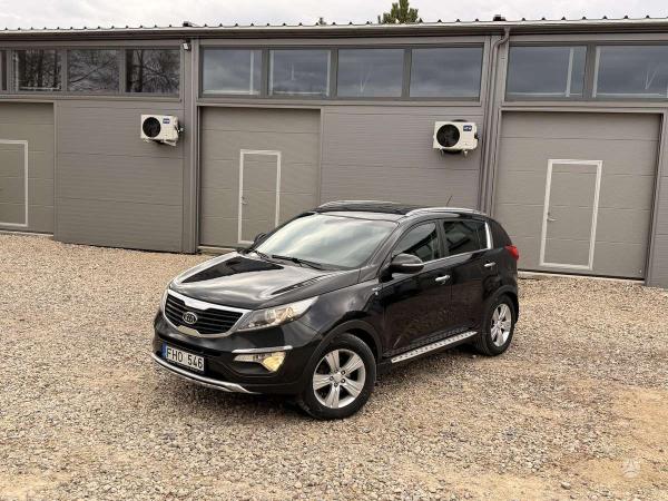 Black Kia Sportage 2011 in Vilnius, with an engine capacity of 2.00 L and mileage of 261 thousand km for 5500 €, photo 5 on AUTOMOTO.COM.LV