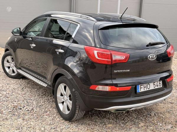 Black Kia Sportage 2011 in Vilnius, with an engine capacity of 2.00 L and mileage of 261 thousand km for 5500 €, photo 9 on AUTOMOTO.COM.LV