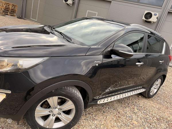 Black Kia Sportage 2011 in Vilnius, with an engine capacity of 2.00 L and mileage of 261 thousand km for 5500 €, photo 11 on AUTOMOTO.COM.LV