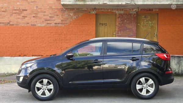 Black Kia Sportage 2011 in Klaipeda, with an engine capacity of 2.36 L and mileage of 157 thousand km for 5600 €, photo 6 on AUTOMOTO.COM.LV