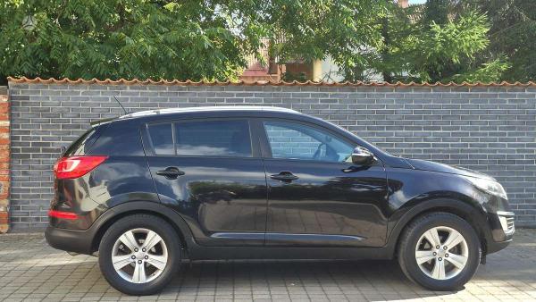 Black Kia Sportage 2011 in Klaipeda, with an engine capacity of 2.36 L and mileage of 157 thousand km for 5600 €, photo 11 on AUTOMOTO.COM.LV