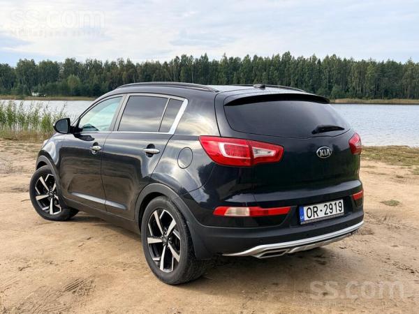 Kia Sportage 2011 in Riga on AUTOMOTO.COM.LV Black Kia Sportage 2011 in Riga, with an engine capacity of 2.00 L and mileage of 377 thousand km for 6500 €, photo 3 on AUTOMOTO.COM.LV