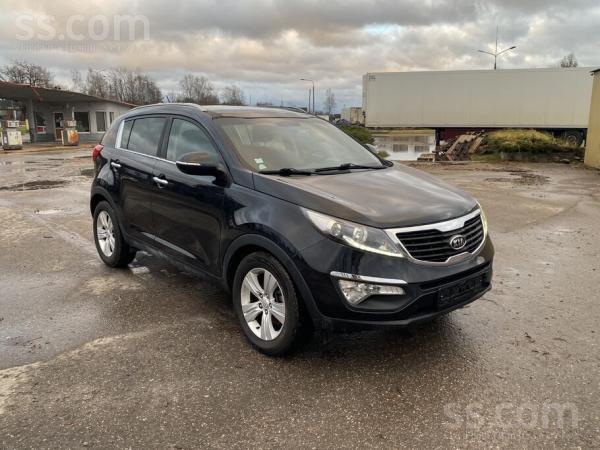 Melns Kia Sportage 2012 Ogre, ar dzinēja tilpumu 1.70 L un nobraukumu 202 tūkst. km par 6490 €, foto 3 vietnē AUTOMOTO.COM.LV