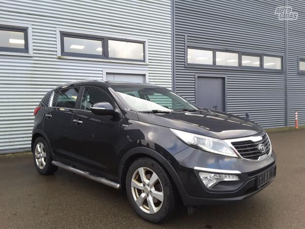 Melns Kia Sportage 2012 Kretinga, ar dzinēja tilpumu 2.00 L un nobraukumu 270 tūkst. km par 7550 €, foto 1 vietnē AUTOMOTO.COM.LV
