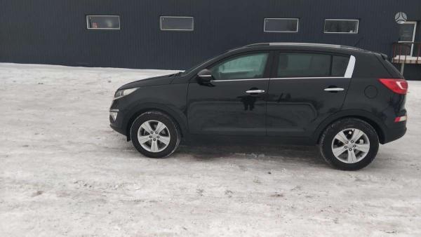 Melns Kia Sportage 2012 Tauragė, ar dzinēja tilpumu 1.69 L un nobraukumu 167 tūkst. km par 7200 €, foto 2 vietnē AUTOMOTO.COM.LV