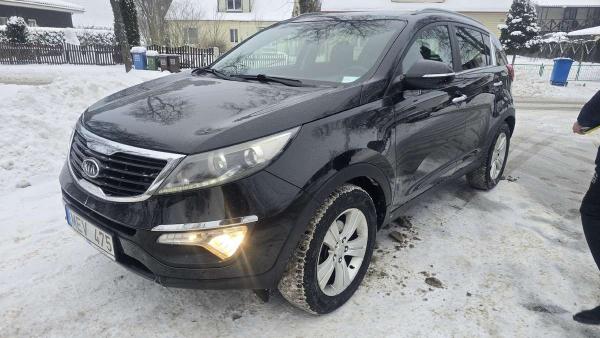 Melns Kia Sportage 2012 Alīta, ar dzinēja tilpumu 2.00 L un nobraukumu 139 tūkst. km par 6450 €, foto 2 vietnē AUTOMOTO.COM.LV