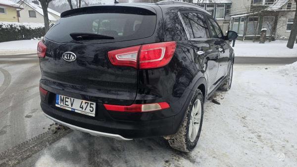 Melns Kia Sportage 2012 Alīta, ar dzinēja tilpumu 2.00 L un nobraukumu 139 tūkst. km par 6450 €, foto 5 vietnē AUTOMOTO.COM.LV