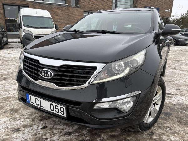 Black Kia Sportage 2012 in Kaunas, with an engine capacity of 2.00 L and mileage of 285 thousand km for 5650 €, photo 2 on AUTOMOTO.COM.LV