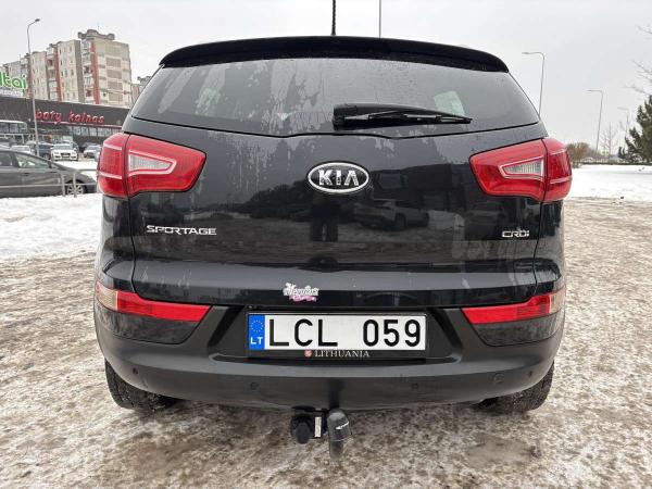 Black Kia Sportage 2012 in Kaunas, with an engine capacity of 2.00 L and mileage of 285 thousand km for 5650 €, photo 8 on AUTOMOTO.COM.LV