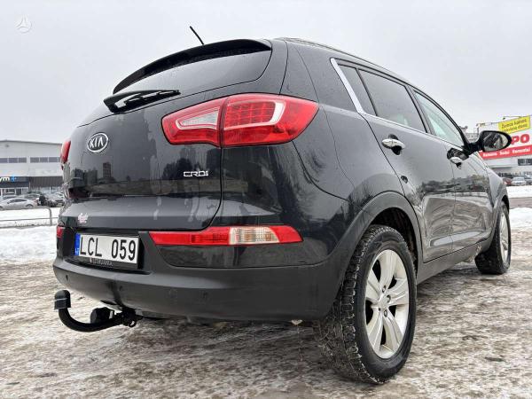 Black Kia Sportage 2012 in Kaunas, with an engine capacity of 2.00 L and mileage of 285 thousand km for 5650 €, photo 10 on AUTOMOTO.COM.LV