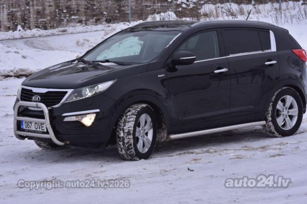 Black Kia Sportage 2012 in Narva, with an engine capacity of 2.00 L and mileage of 206 thousand km for 8200 €, photo 2 on AUTOMOTO.COM.LV