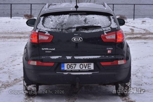 Black Kia Sportage 2012 in Narva, with an engine capacity of 2.00 L and mileage of 206 thousand km for 8200 €, photo 8 on AUTOMOTO.COM.LV
