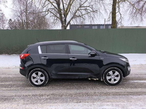 Melns Kia Sportage 2012 Marijampole, ar dzinēja tilpumu 2.00 L un nobraukumu 263 tūkst. km par 6550 €, foto 6 vietnē AUTOMOTO.COM.LV