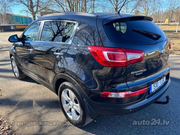 Black Kia Sportage 2012 in Paide, with an engine capacity of 1.60 L and mileage of 256 thousand km for 5590 €, photo 4 on AUTOMOTO.COM.LV