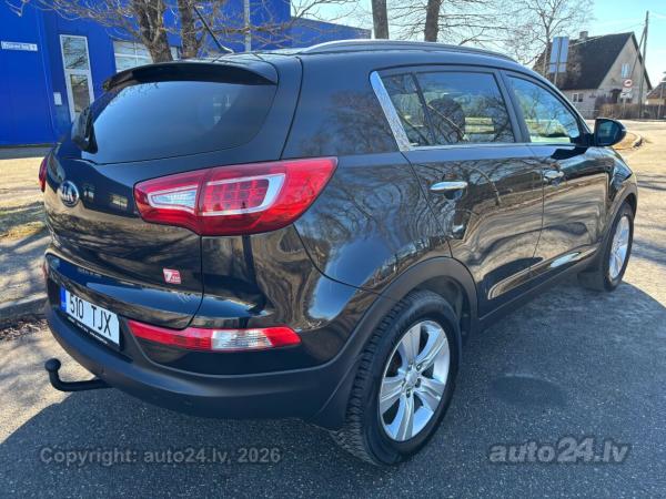 Black Kia Sportage 2012 in Paide, with an engine capacity of 1.60 L and mileage of 256 thousand km for 5590 €, photo 5 on AUTOMOTO.COM.LV