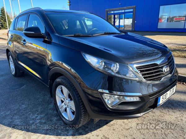 Black Kia Sportage 2012 in Paide, with an engine capacity of 1.60 L and mileage of 256 thousand km for 5590 €, photo 6 on AUTOMOTO.COM.LV
