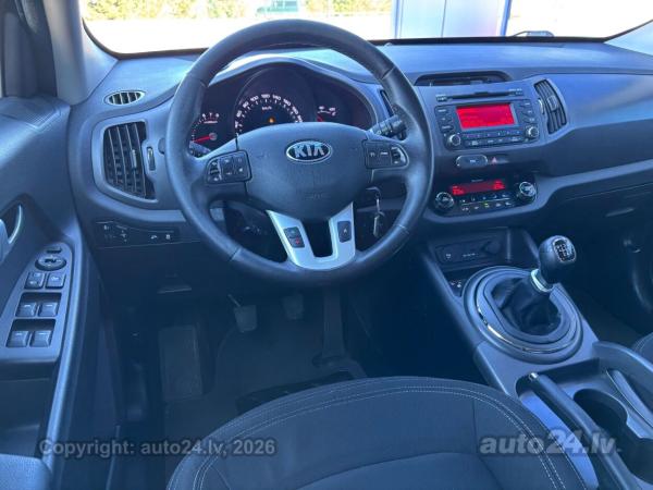 Black Kia Sportage 2012 in Paide, with an engine capacity of 1.60 L and mileage of 256 thousand km for 5590 €, photo 11 on AUTOMOTO.COM.LV