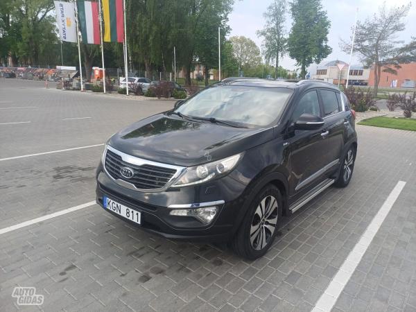 Black Kia Sportage 2012 in Klaipeda, with an engine capacity of 2.00 L and mileage of 188 thousand km for 8500 €, photo 1 on AUTOMOTO.COM.LV