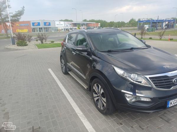 Black Kia Sportage 2012 in Klaipeda, with an engine capacity of 2.00 L and mileage of 188 thousand km for 8500 €, photo 3 on AUTOMOTO.COM.LV