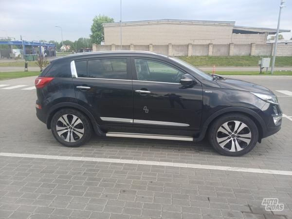 Black Kia Sportage 2012 in Klaipeda, with an engine capacity of 2.00 L and mileage of 188 thousand km for 8500 €, photo 4 on AUTOMOTO.COM.LV