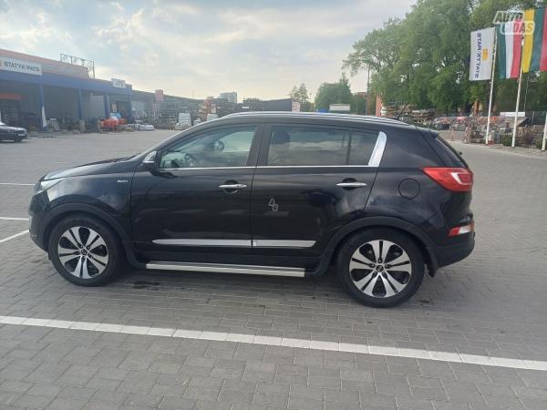 Black Kia Sportage 2012 in Klaipeda, with an engine capacity of 2.00 L and mileage of 188 thousand km for 8500 €, photo 5 on AUTOMOTO.COM.LV