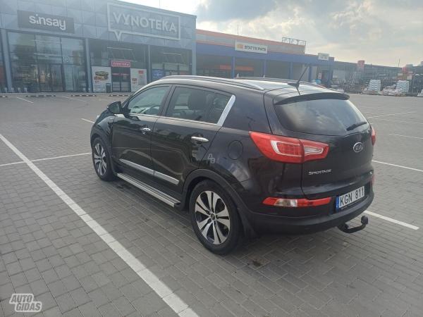 Black Kia Sportage 2012 in Klaipeda, with an engine capacity of 2.00 L and mileage of 188 thousand km for 8500 €, photo 7 on AUTOMOTO.COM.LV