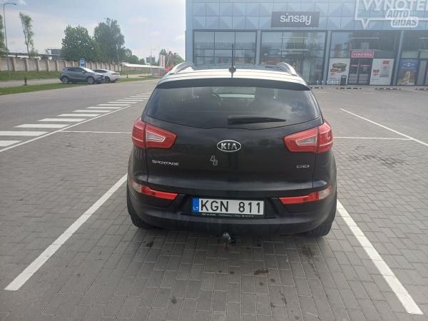 Black Kia Sportage 2012 in Klaipeda, with an engine capacity of 2.00 L and mileage of 188 thousand km for 8500 €, photo 8 on AUTOMOTO.COM.LV