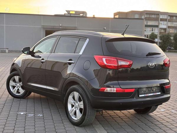 Melns Kia Sportage 2012 Raseiniai, ar dzinēja tilpumu 2.00 L un nobraukumu 271 tūkst. km par 6700 €, foto 10 vietnē AUTOMOTO.COM.LV