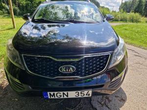 Melns Kia Sportage 2012 Mažeikiai, ar dzinēja tilpumu 2.00 L un nobraukumu 248 tūkst. km par 7600 €, foto  vietnē AUTOMOTO.COM.LV