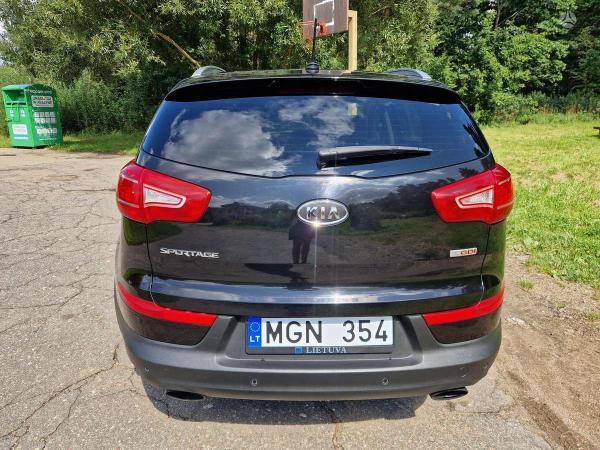 Black Kia Sportage 2012 in Mazeikiai, with an engine capacity of 2.00 L and mileage of 248 thousand km for 7600 €, photo 7 on AUTOMOTO.COM.LV