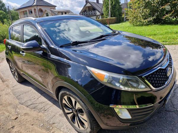 Black Kia Sportage 2012 in Mazeikiai, with an engine capacity of 2.00 L and mileage of 248 thousand km for 7600 €, photo 8 on AUTOMOTO.COM.LV