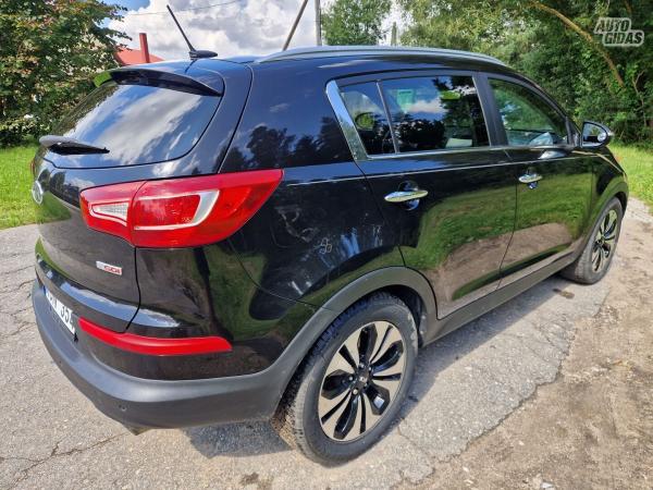 Melns Kia Sportage 2012 Mažeikiai, ar dzinēja tilpumu 2.00 L un nobraukumu 245 tūkst. km par 7000 €, foto 8 vietnē AUTOMOTO.COM.LV