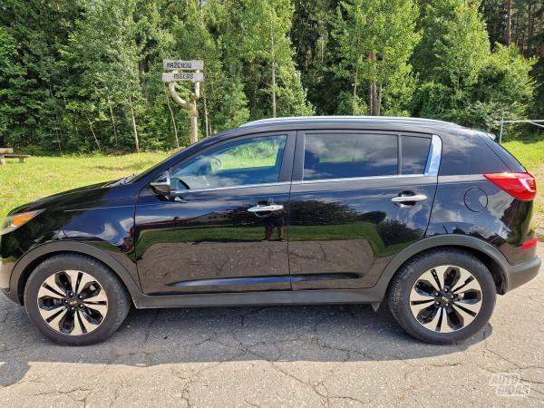 Melns Kia Sportage 2012 Mažeikiai, ar dzinēja tilpumu 2.00 L un nobraukumu 245 tūkst. km par 7000 €, foto 10 vietnē AUTOMOTO.COM.LV