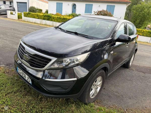 Black Kia Sportage 2012 in Kaunas, with an engine capacity of 1.59 L and mileage of 190 thousand km for 2499 €, photo 3 on AUTOMOTO.COM.LV