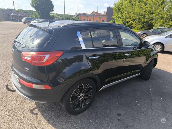 Black Kia Sportage 2012 in Kaunas, with an engine capacity of 2.00 L and mileage of 217 thousand km for 7500 €, photo 2 on AUTOMOTO.COM.LV