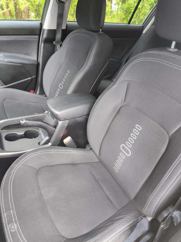 Black Kia Sportage 2012 in Kaunas, with an engine capacity of 2.00 L and mileage of 217 thousand km for 7500 €, photo 7 on AUTOMOTO.COM.LV
